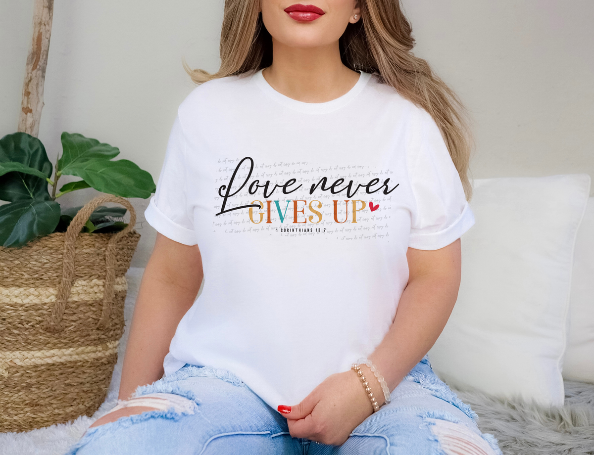 Love Never Gives Up 1 Corinthians 13:7 76648 DTF Transfer – Mud & Grace Transfers
