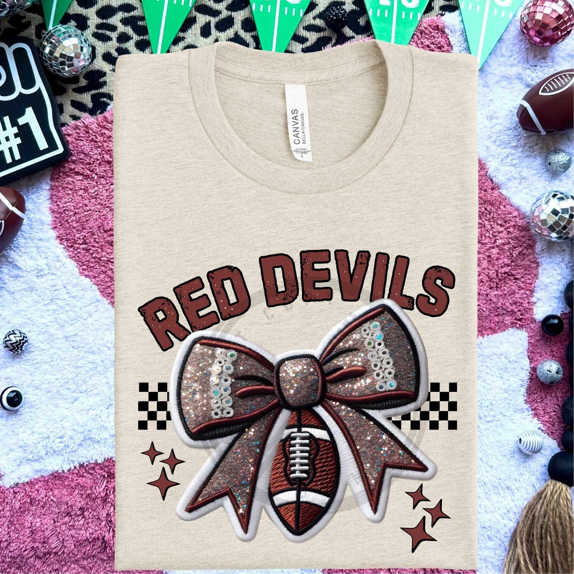 Red devils bow and football (HW) 58349 DTF transfer – Mud & Grace Transfers